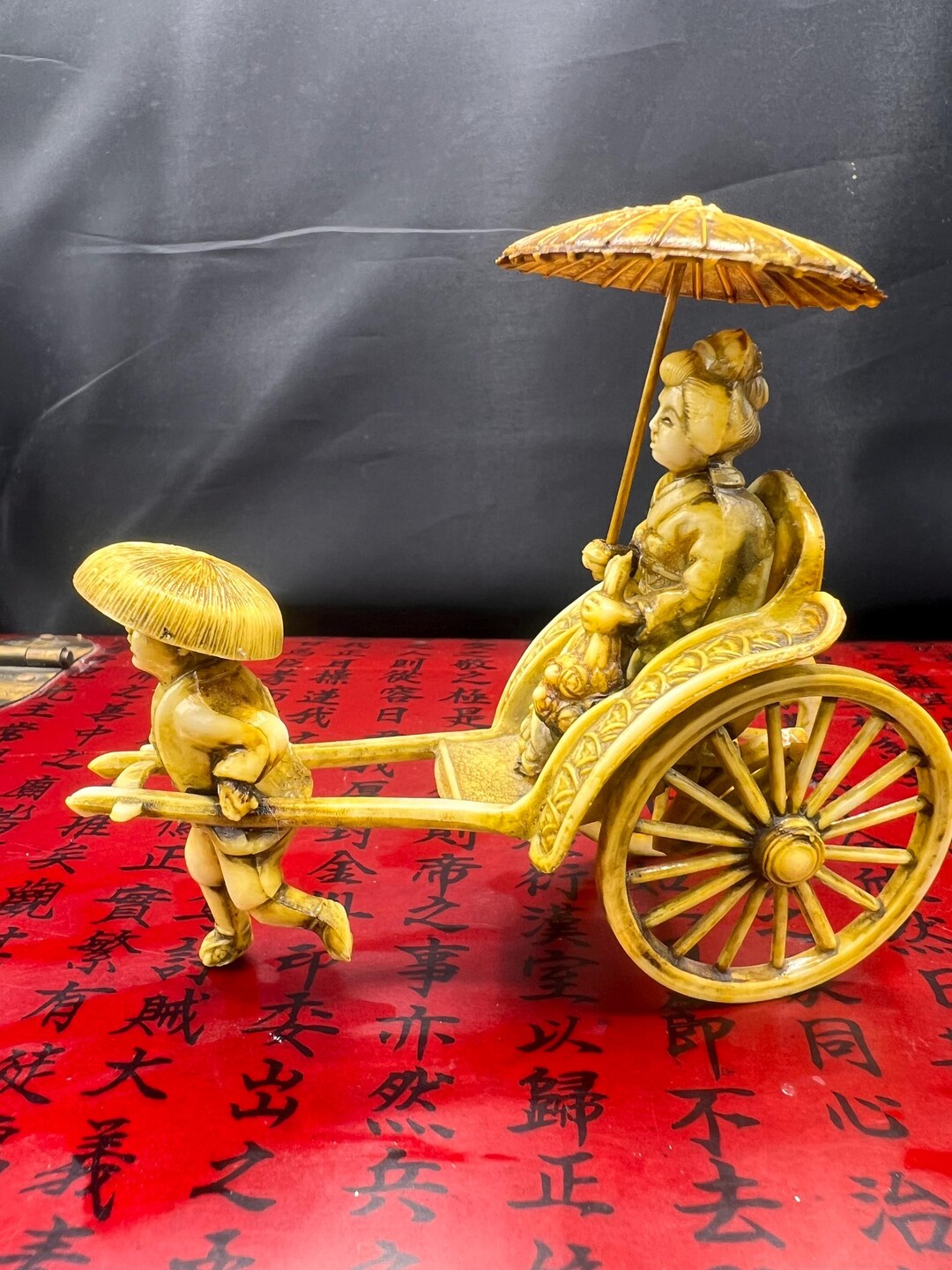 Vintage Japanese Celluloid Figurines Woman on Rickshaw, She is Holding ...