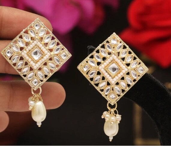White kundan earrings store