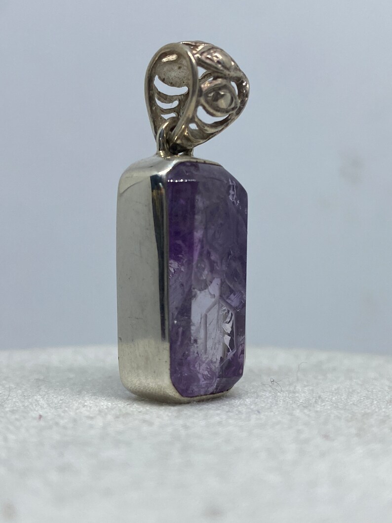 Amethyst Symbol Pendant light Language realise Set in Sterling Silver ...