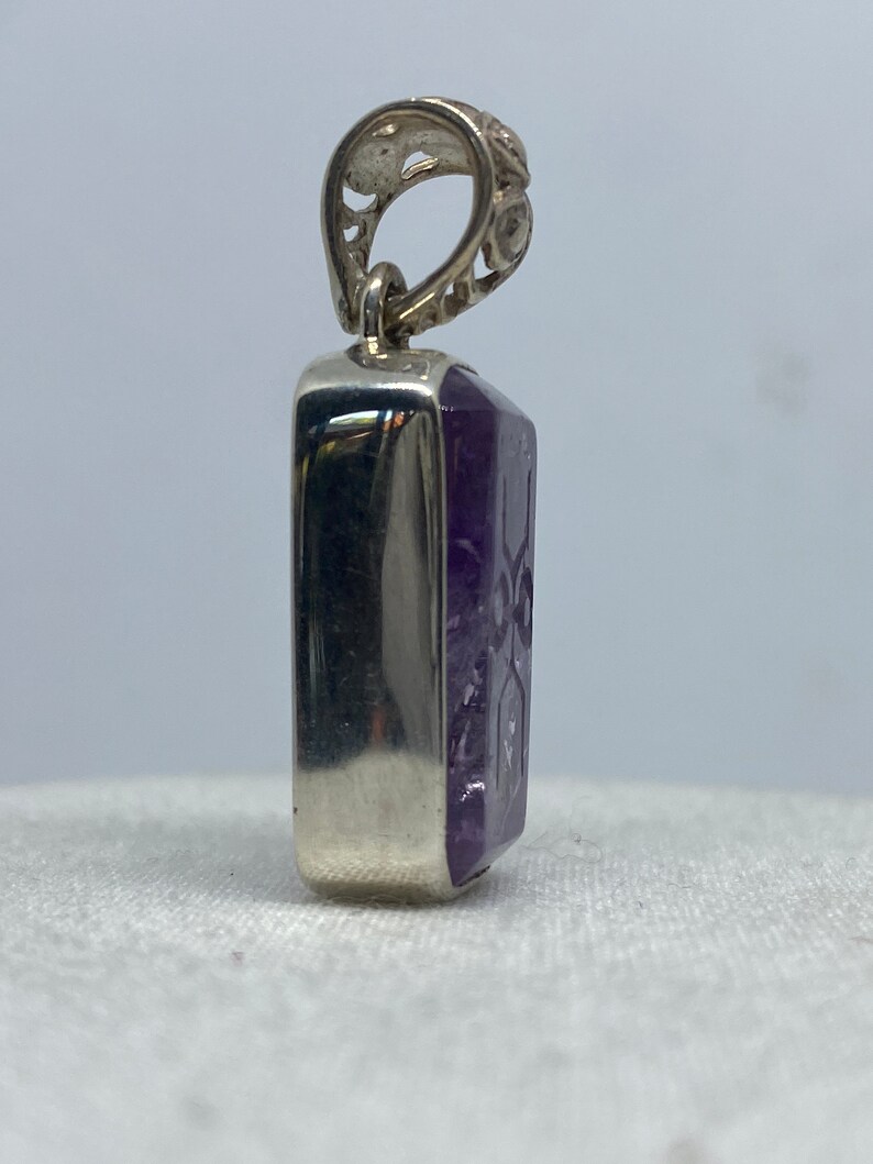 Amethyst Symbol Pendant light Language realise Set in Sterling Silver ...