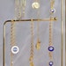 White and Gold Sunburst Eye Protection Symbol Necklace - Etsy