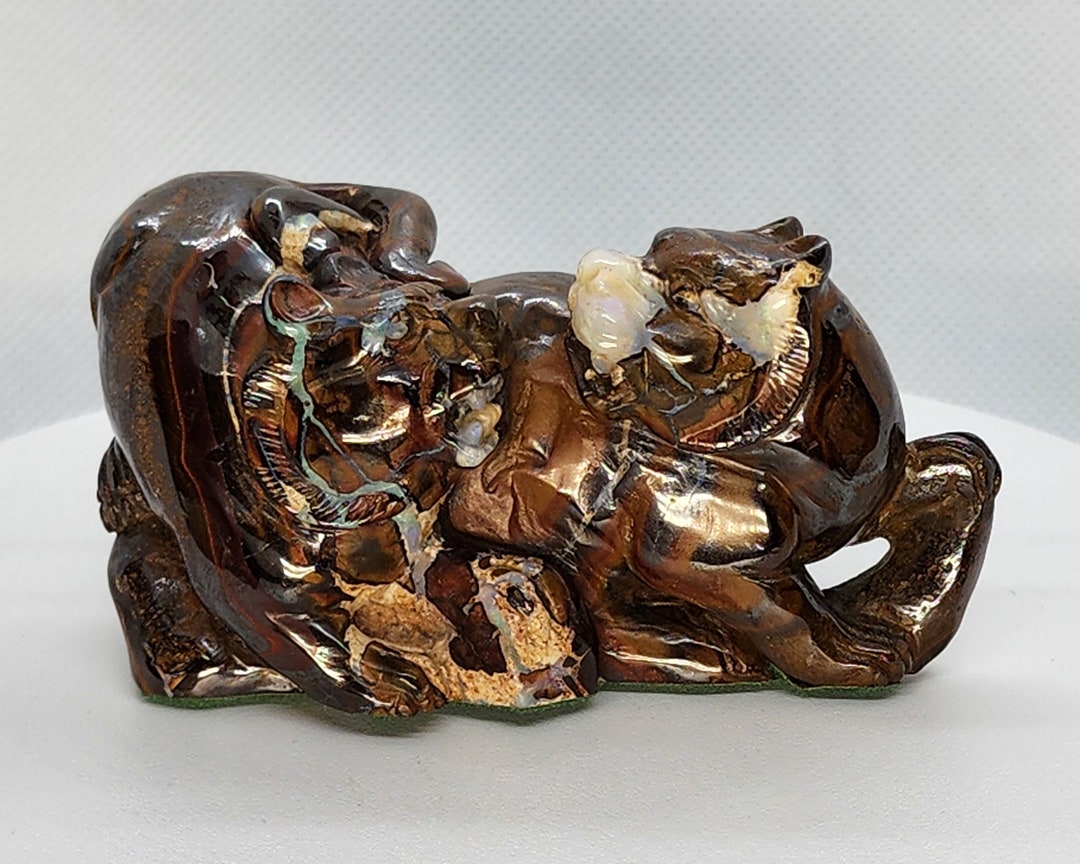 35983.0 Boulder Opal Carving of Two Lions Fighting 645.99 Carats 80 Mmw ...