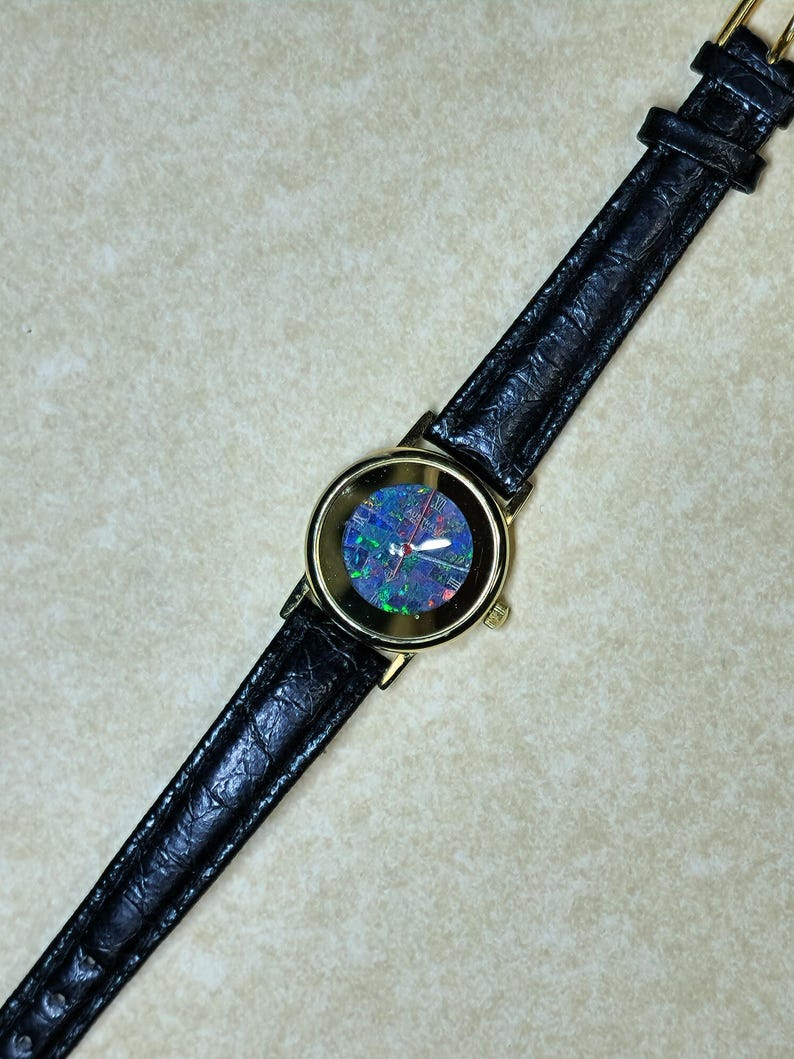 54181.0 - Vintage Australian Opal Watch: Gold Rim, Black Leather Strap ...