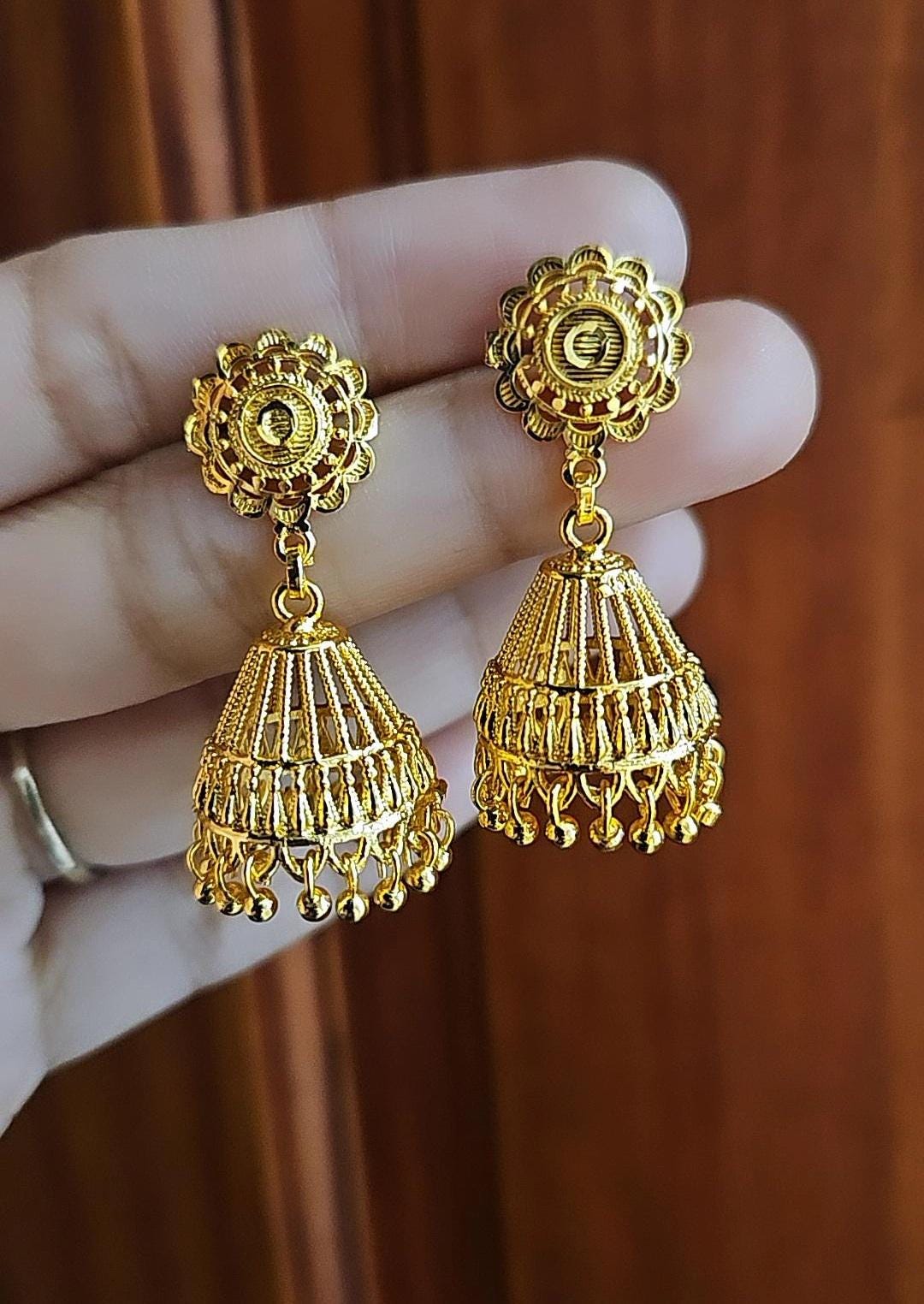 Gold jhumka for women store