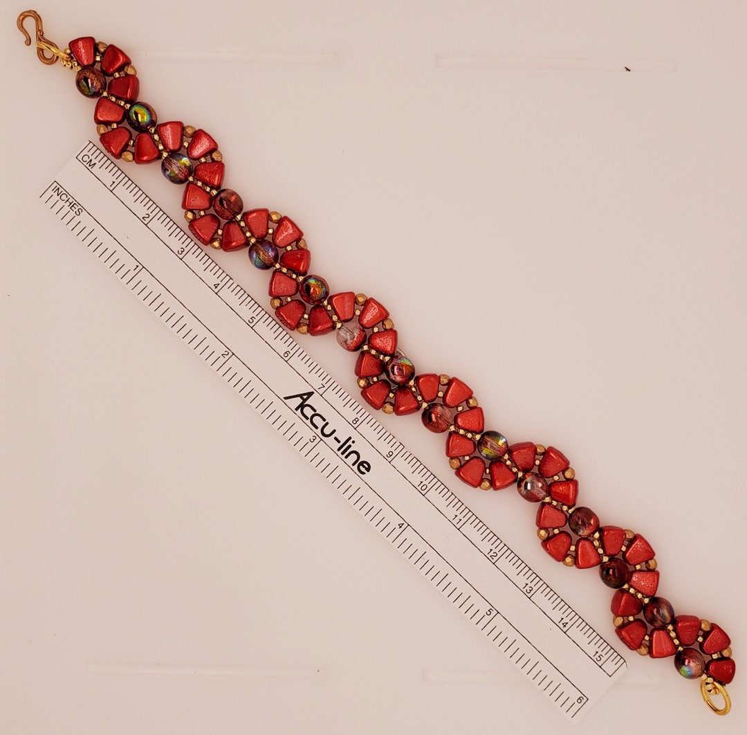 Nib-bit Bracelet With Arcs of Red Nib-bits, Iridescent 6mm Round Beads ...