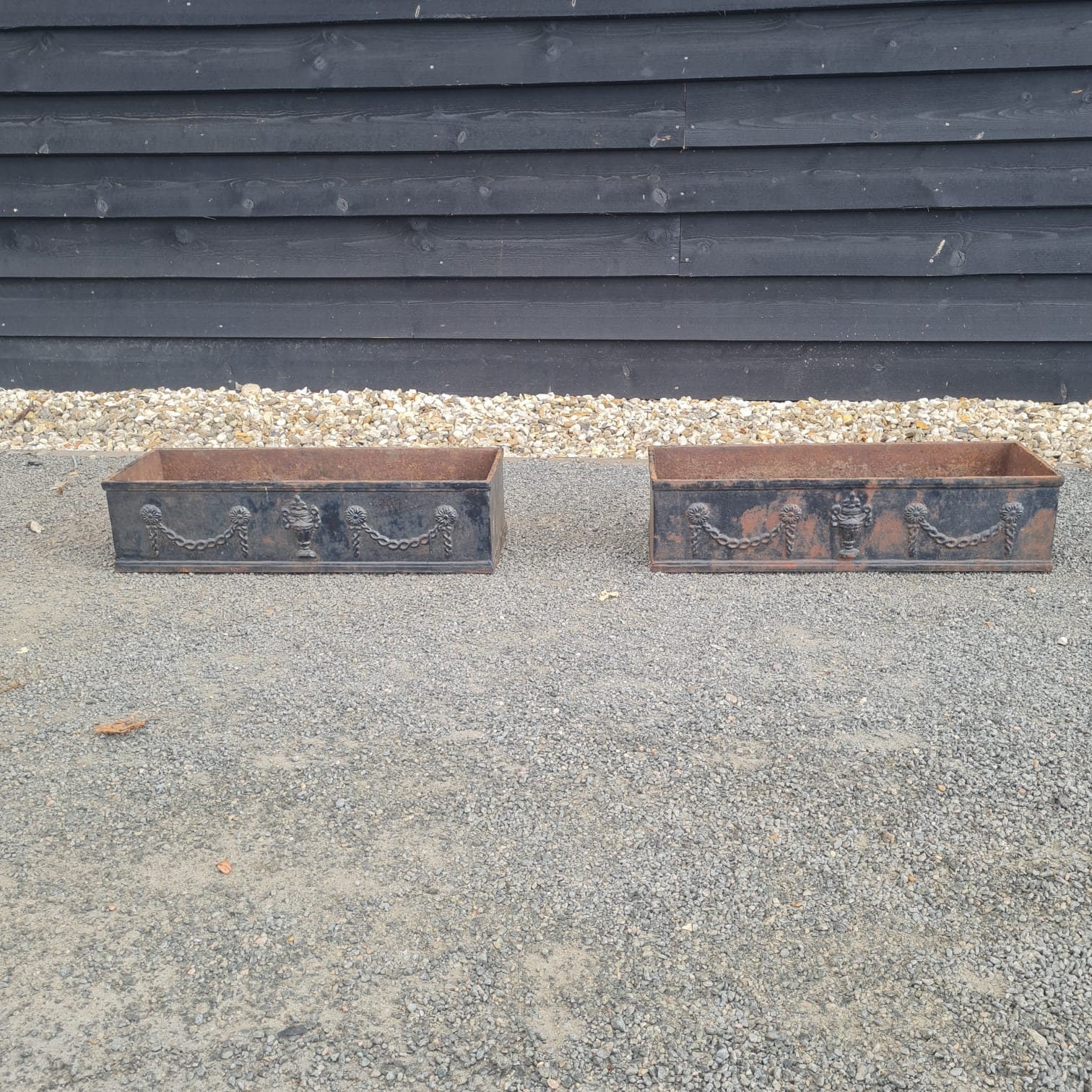 Pair of cast iron trough planters