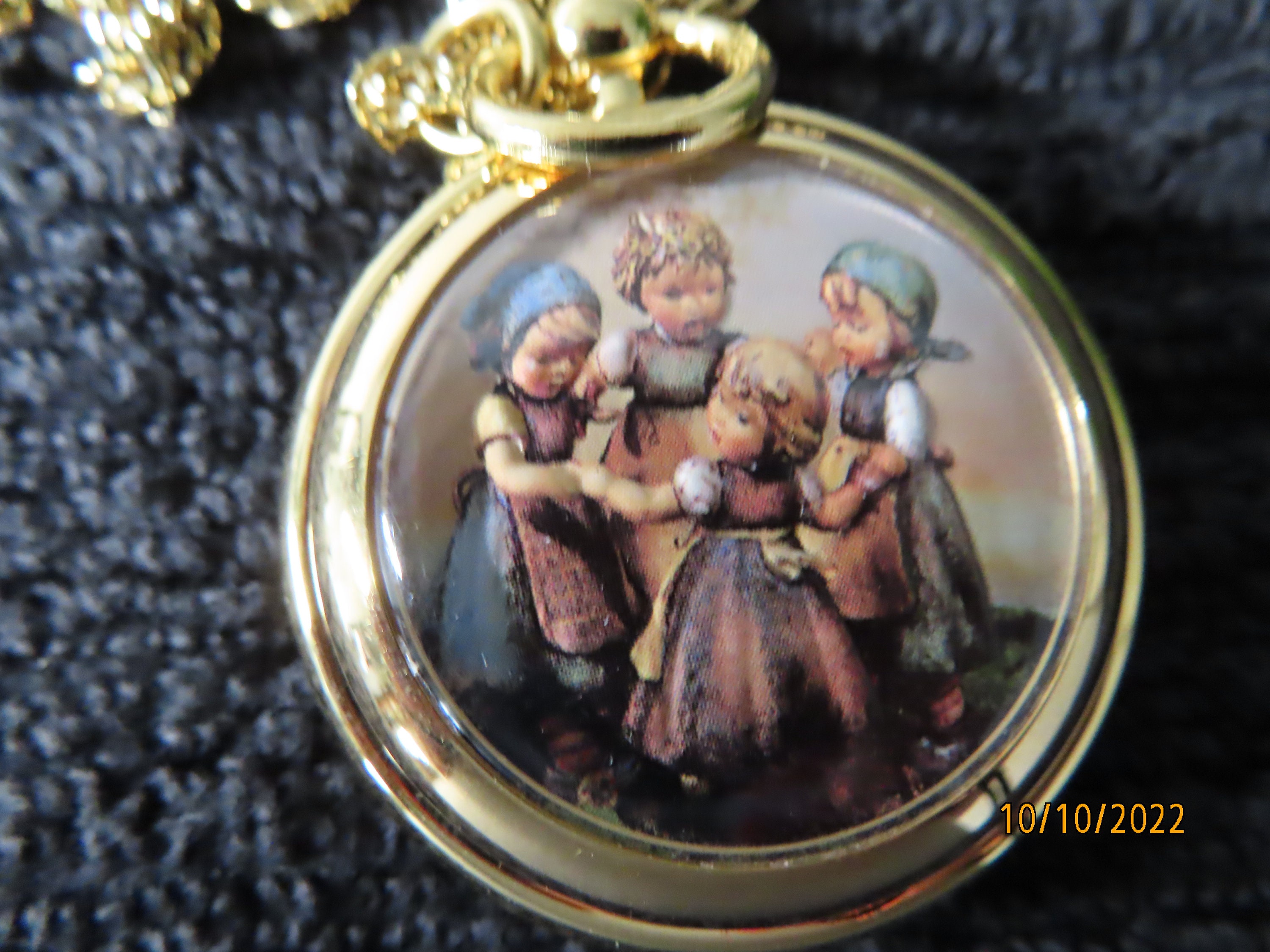 M. I. Hummel ring Around the Rosie Pendant Watch - Etsy