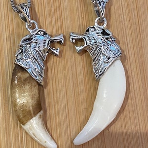 A Real Tibetan Wolf Tooth Mounted in a Silver Plated Wolf Figure ...