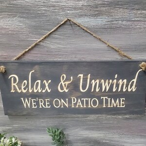 Relax & Unwind We’re on Patio Time Hanging Wood Sign | Outdoor Sign ...