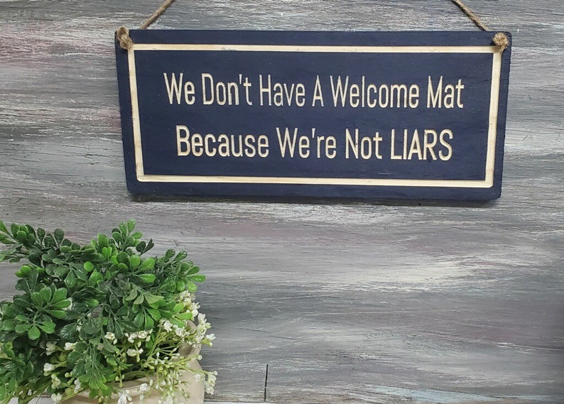 We Don’t Have a Welcome Mat Because We’re Not Liars Hanging Sign ...