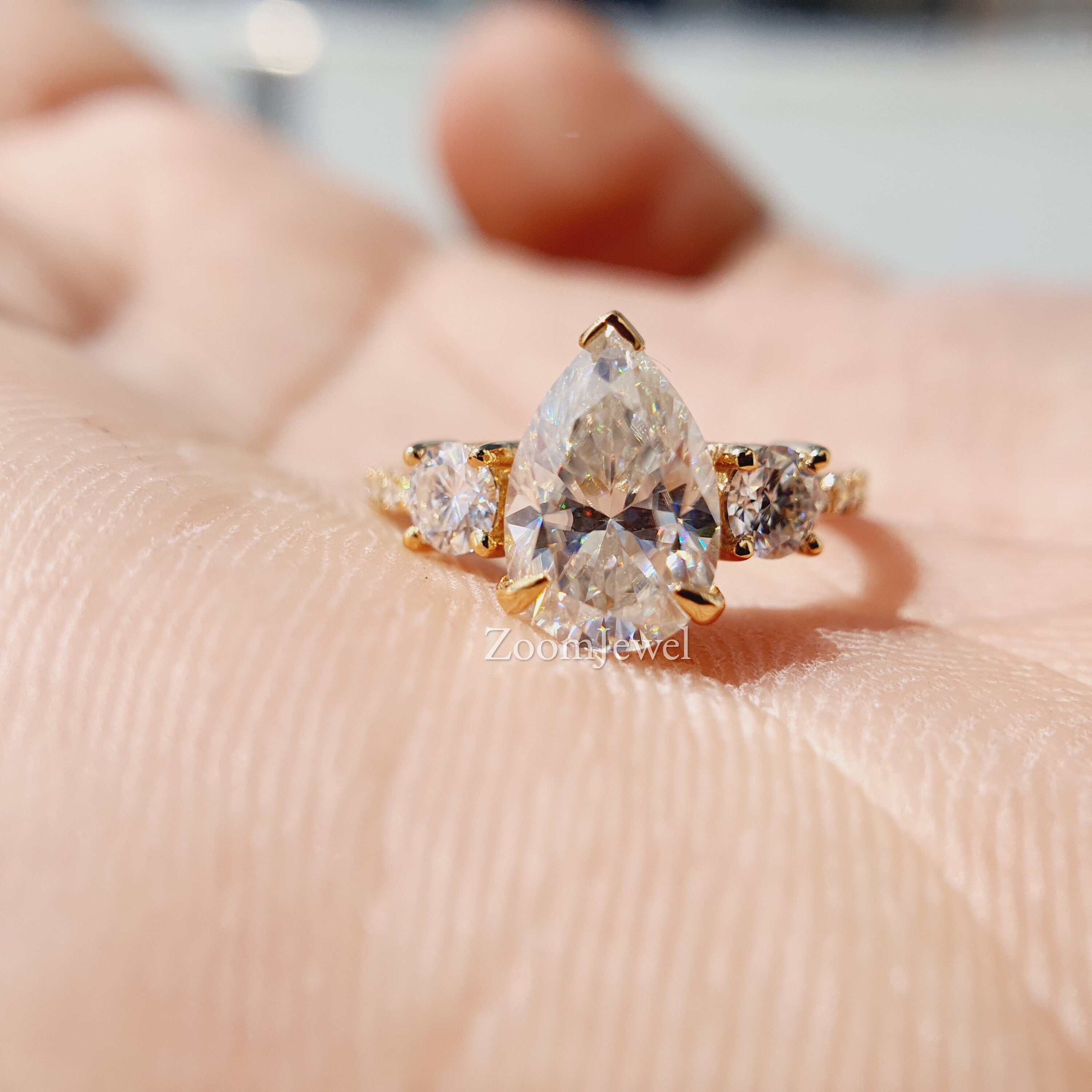 3 Stone Pear Engagement Rings