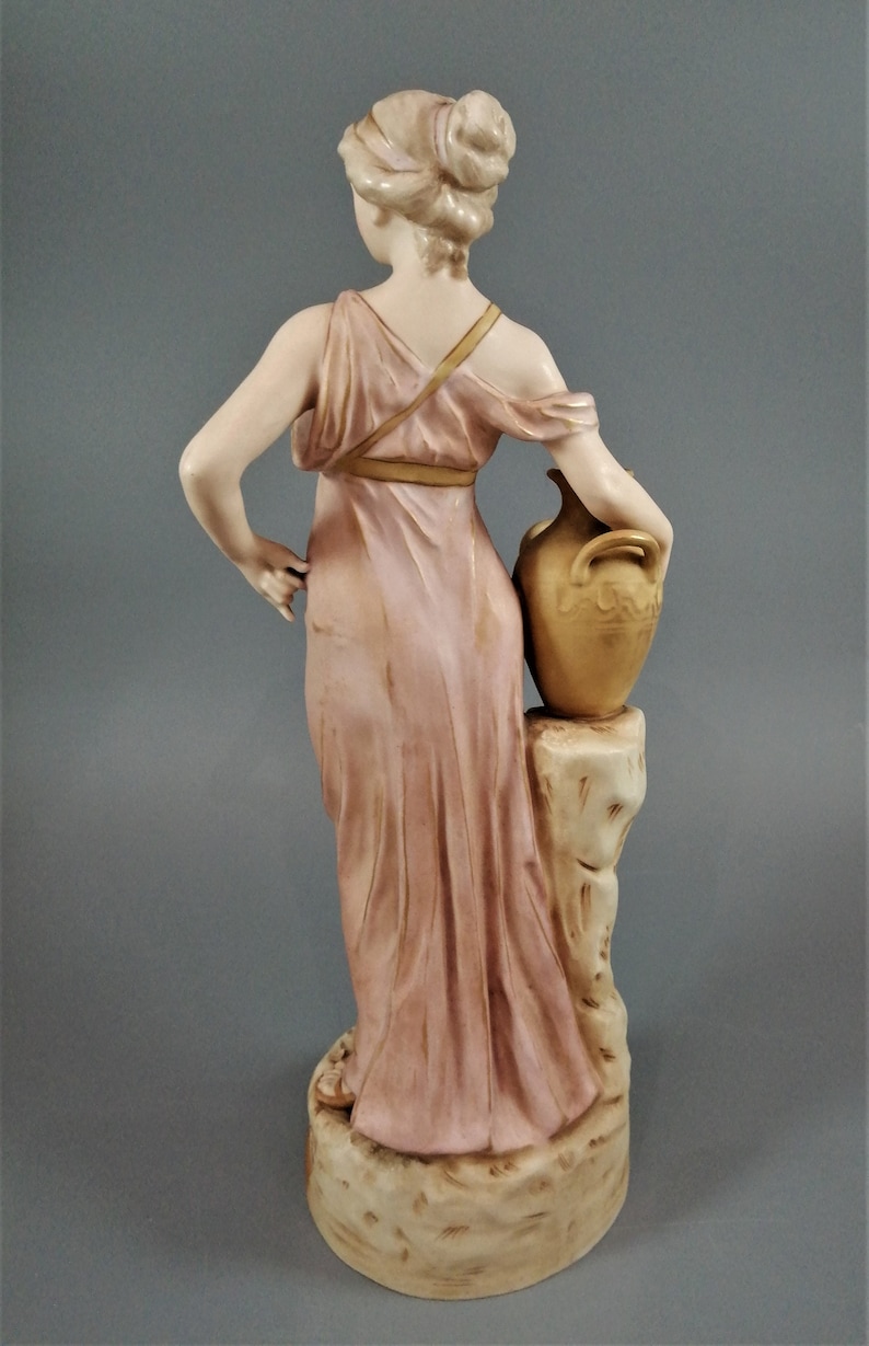 Beautiful Antique Royal Dux Porcelain Figurine Depicting a Lady Holding ...