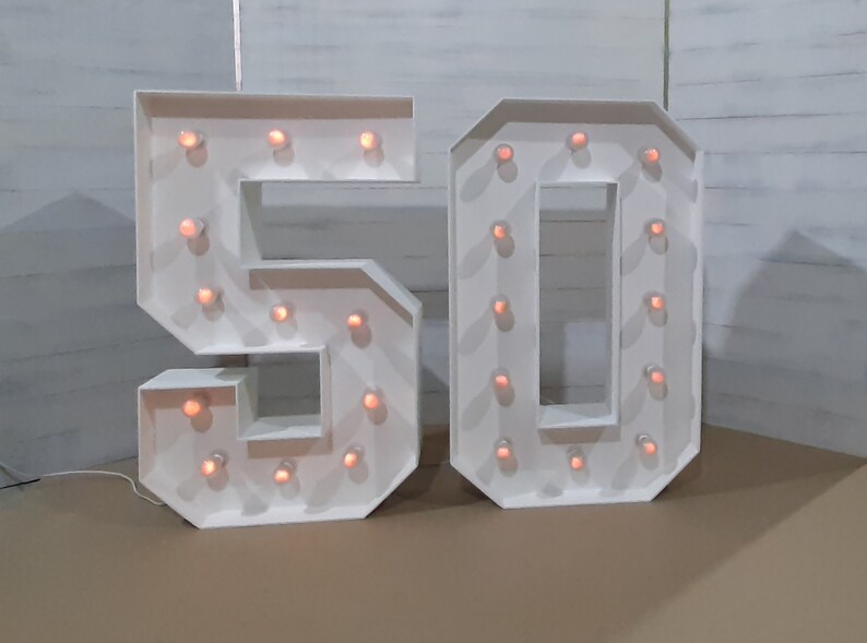 Big Numbers. Twisting Decor for Your Anniversary. Giant Numbers With ...
