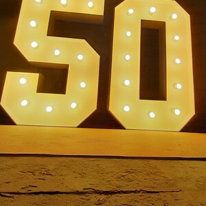 Big Numbers. Twisting Decor for Your Anniversary. Giant Numbers With ...