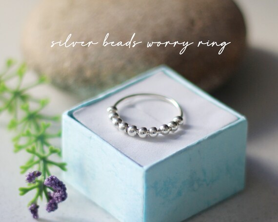 Ring with beads for anxiety store