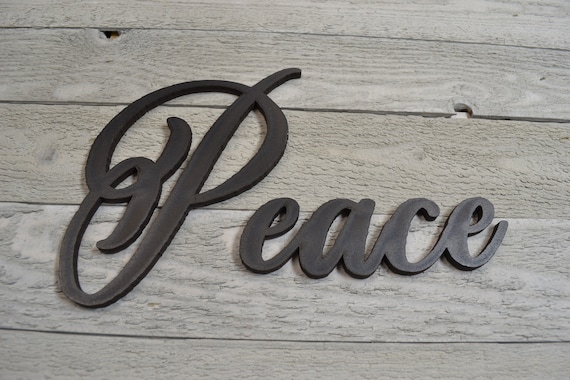 The Word Peace In Cursive