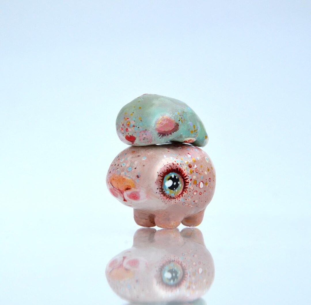 Figurines of Two Fanciful Fairy-tale Creatures, One Standing, the Other ...