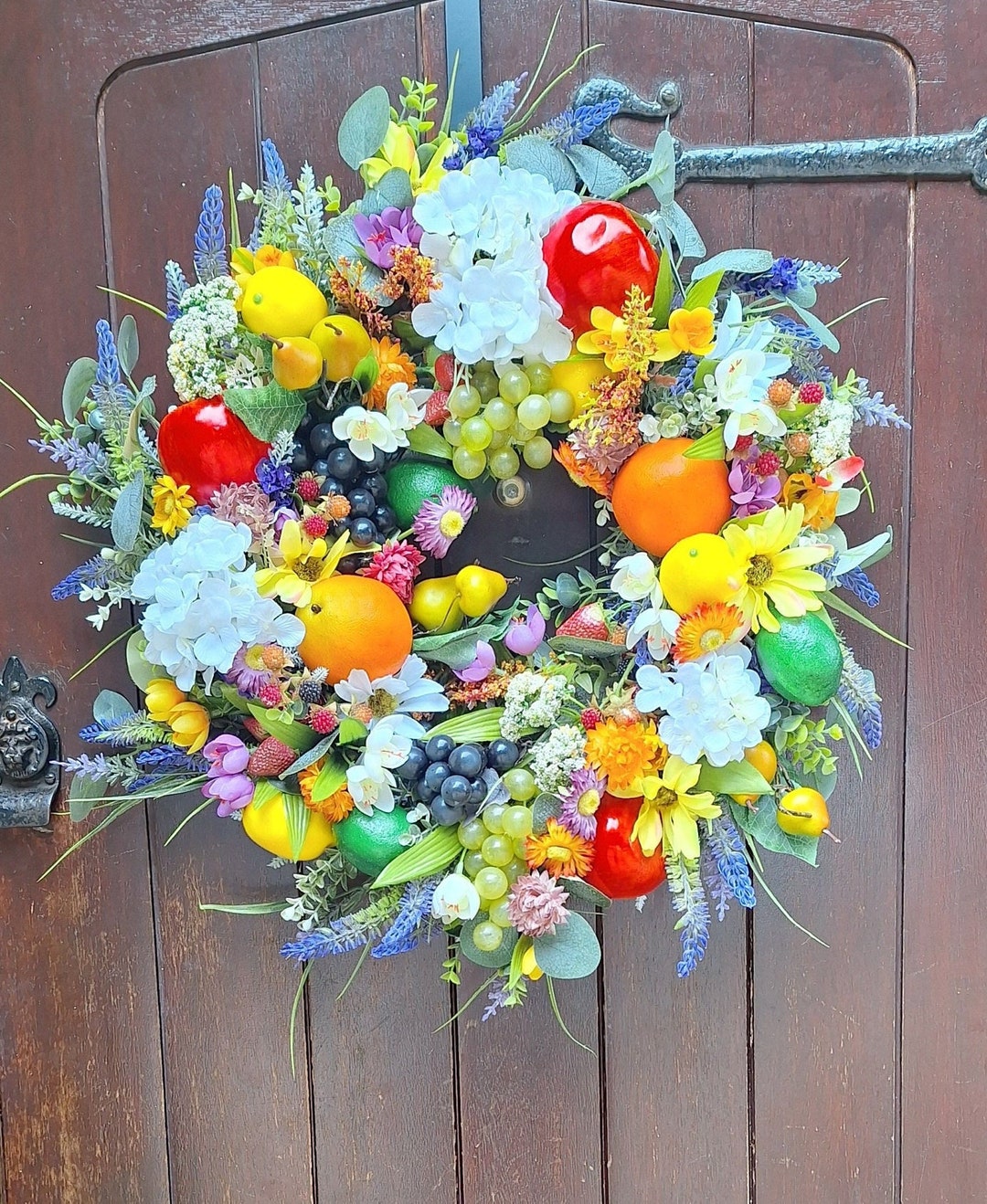 Bright Colourful Wreath With Artificial Fruit, Oranges, Apples, Green ...
