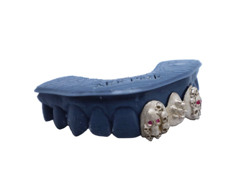 3 Tooth Skull Grillz W Ruby Eyes and Spike Tooth - Etsy