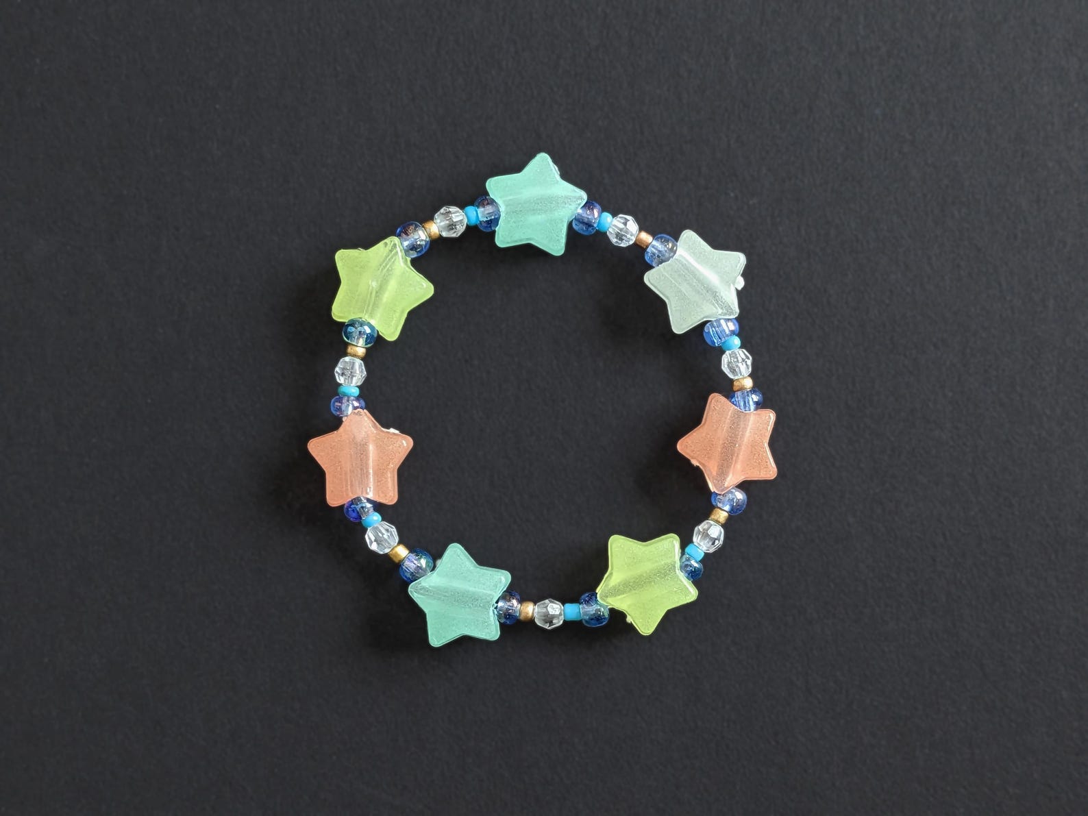 Jayvik Bracelets - Arcane Themed Glow in the Dark Star Beaded Bracelet ...