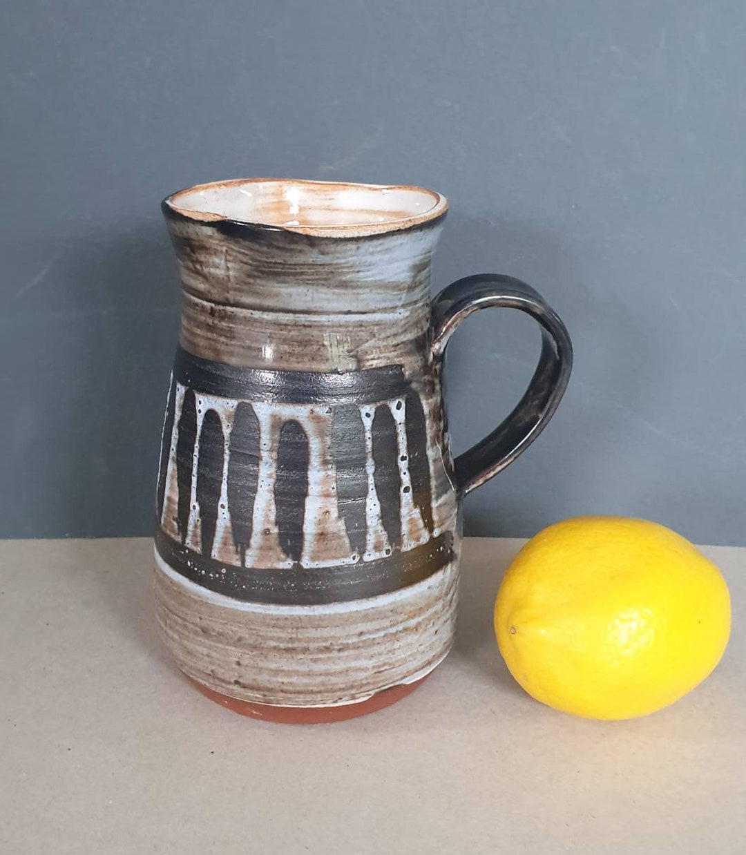 A Vintage Llangollen Pottery 5 Inch Tall Jug With Tribal Inspired ...