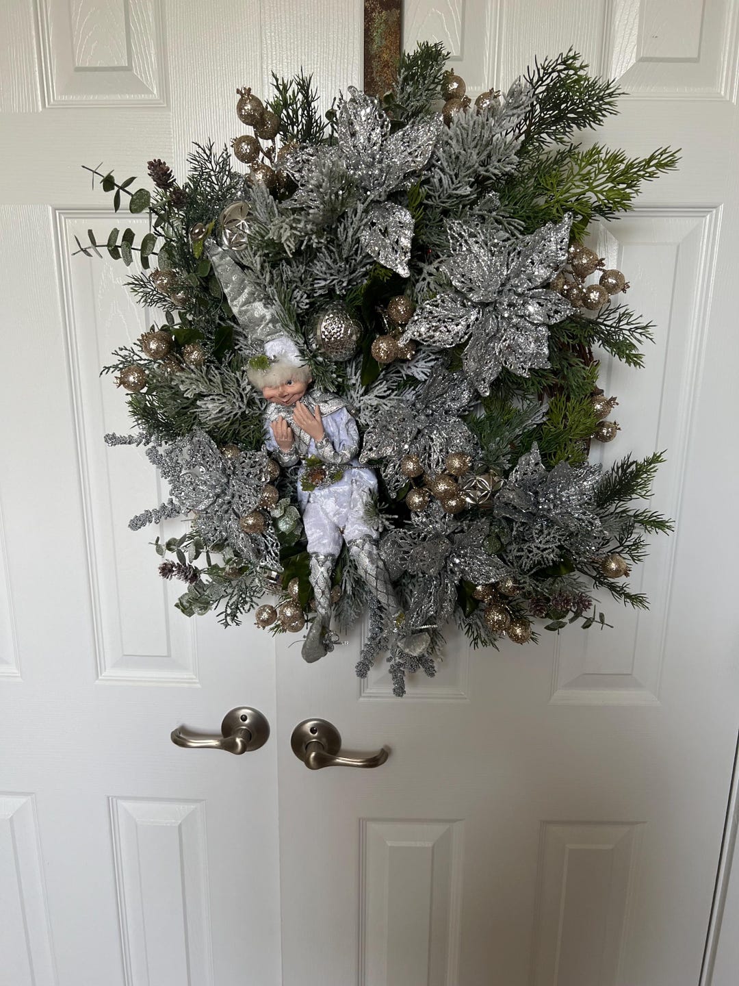 Christmas Elf Wreath Made With Elf, Silver Poinsettias and Balls ...