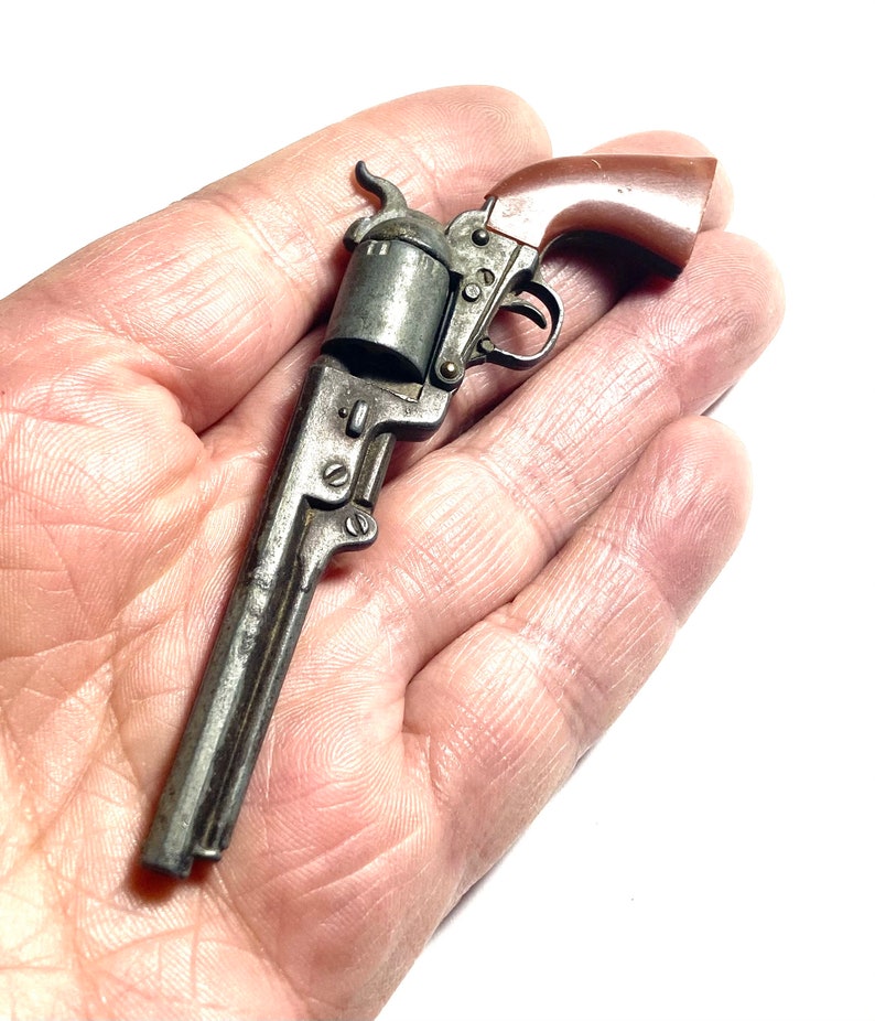 Antique Toy Pop Gun 3 75 Inches Long Bakelite Steel Etsy antique-toy-pop-gun-3-75-inches-long-bakelite-steel-etsy