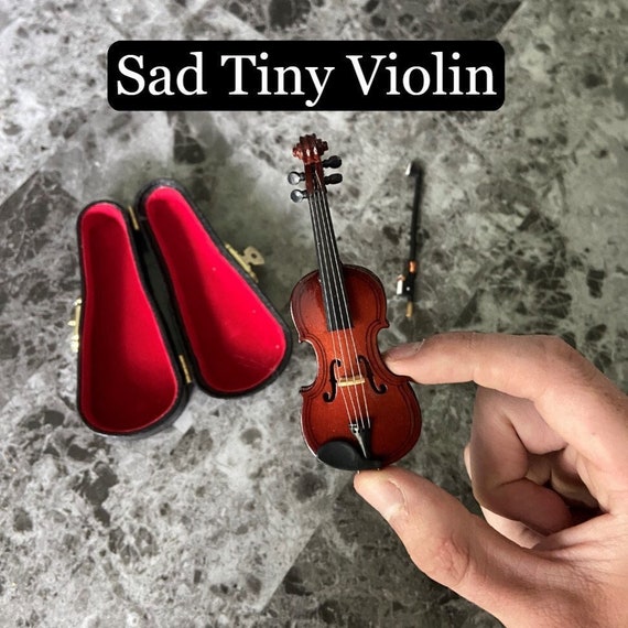 Playing Violin Sad