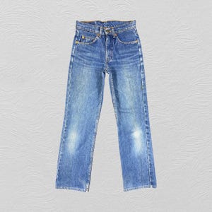 26x29.5 90's Vintage Levi's USA Jeans Light Blue Wash Denim 26x29.5 90's Vintage Levi's USA Jeans Light Blue Wash Denim
