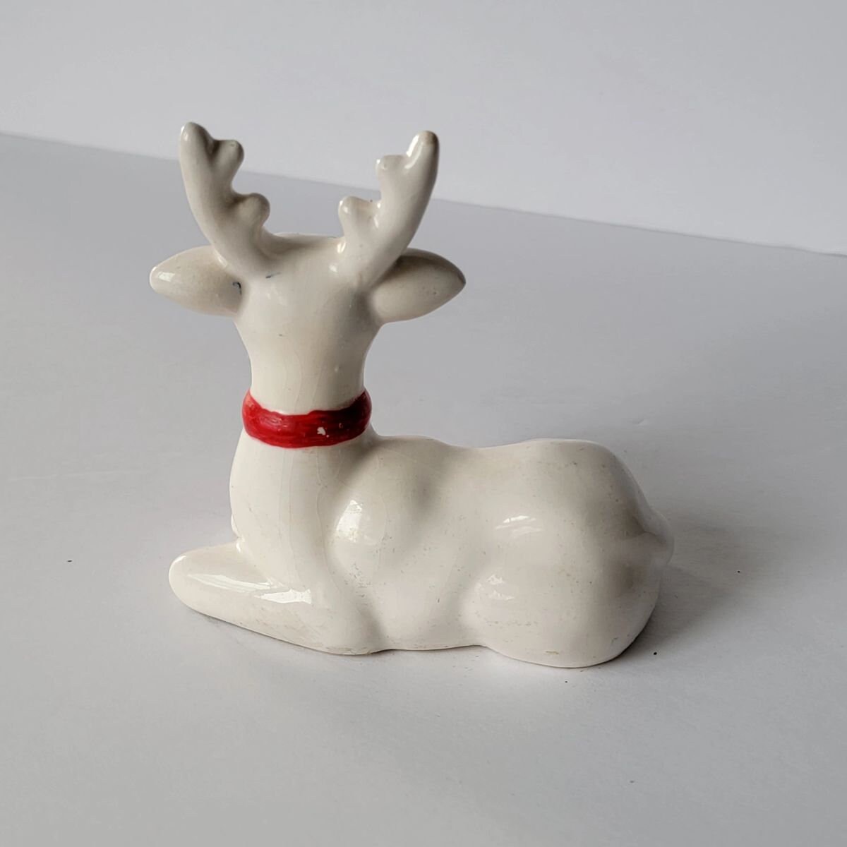 White Ceramic Deer With Red Bow - Etsy