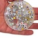 The Happiest Picking Pad Fidget Pick Palette Toy - Circle Sunshine and ...
