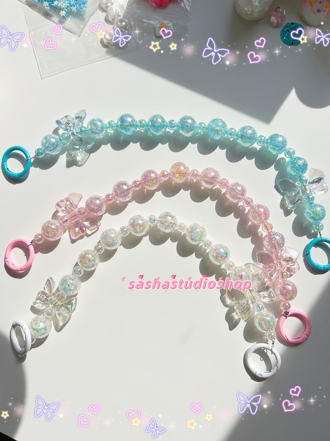 Beautiful Trendy Glitter Acrylic Phone Chain With Bows Keychain Bag ...