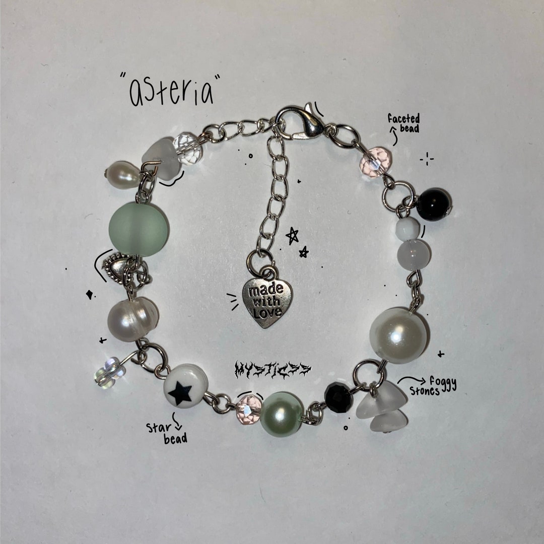 Themed asteria Semi-cluttered Charm Bracelet - Etsy