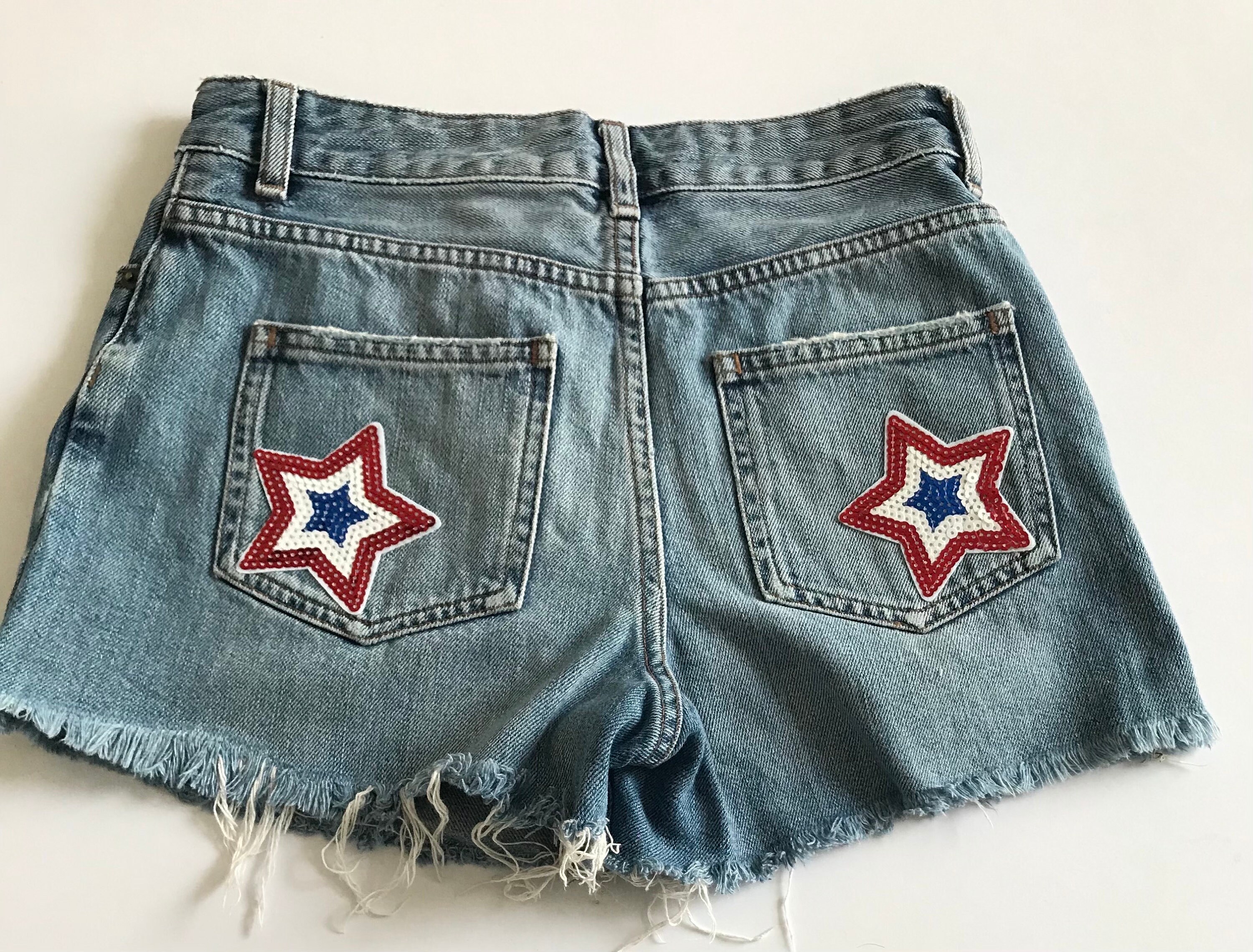 Upcycled Denim Shorts With Star Patches Attached to the Back Pockets ...