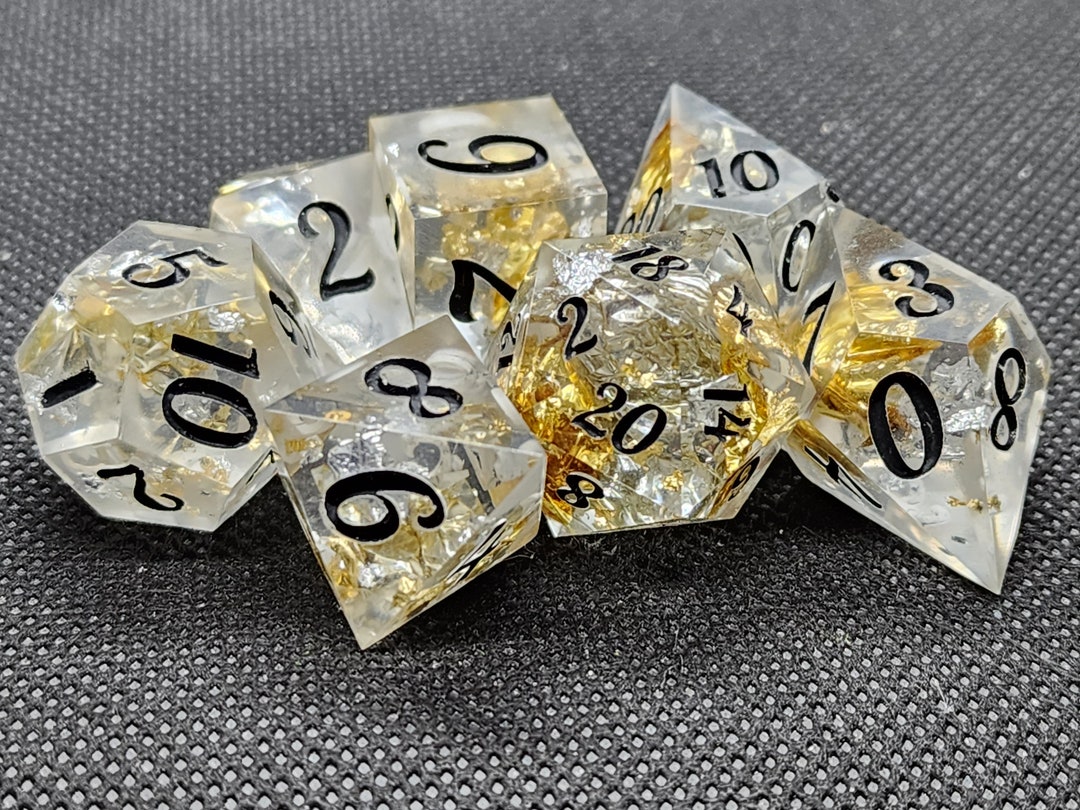The Merchant Seven Piece Dice Set - Etsy