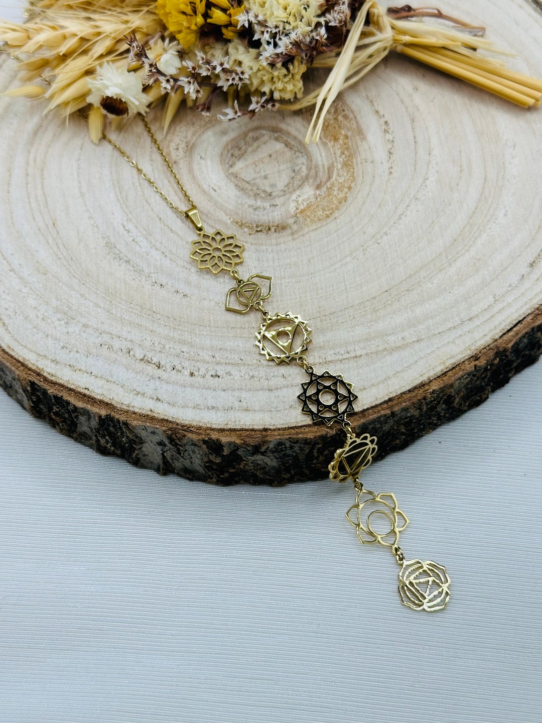 Plunging Necklace With Its Symbols Signifying the Seven Chakras ...