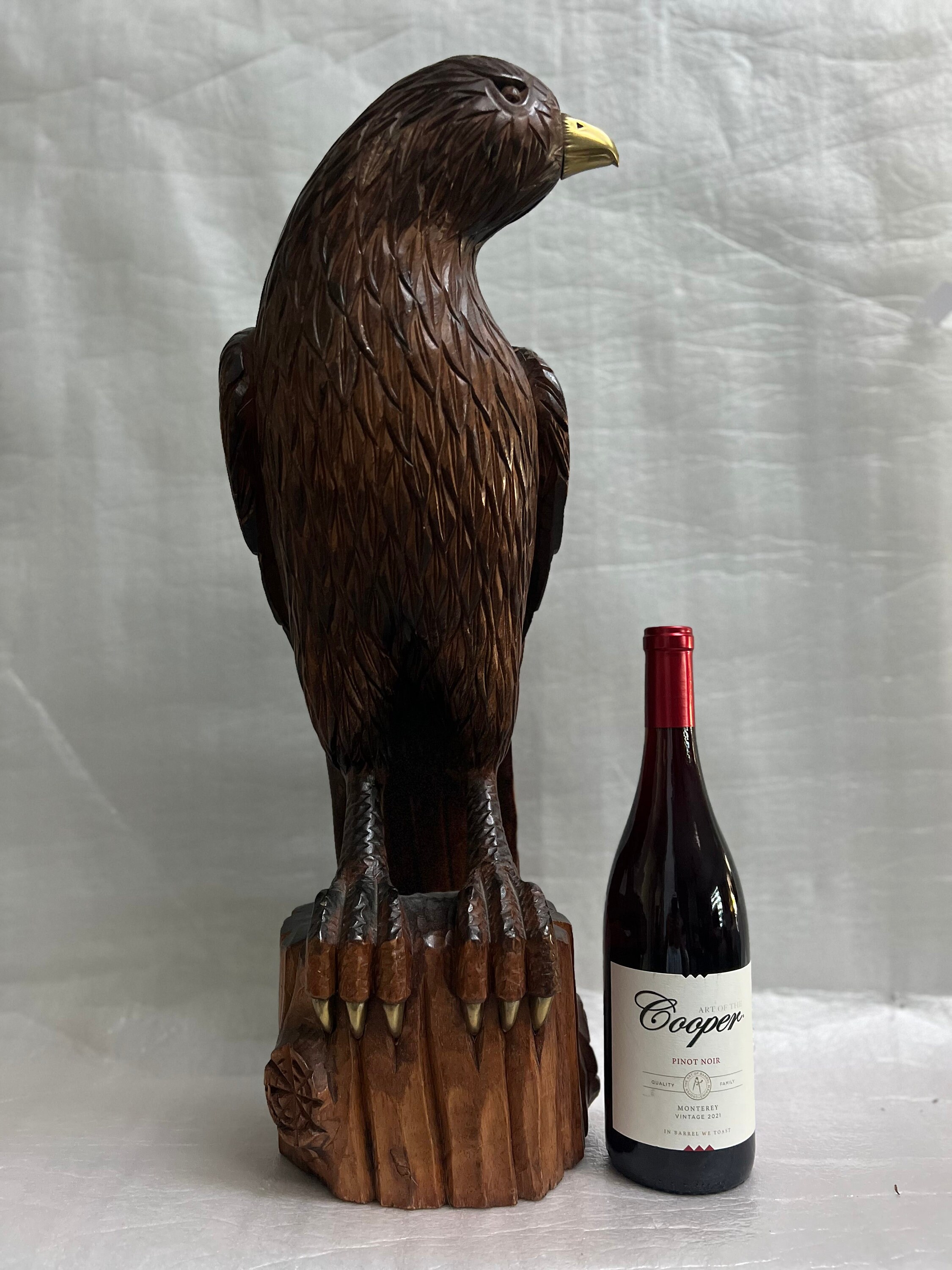 A Hand Carved and Contrastingly Stained Wood Eagle Perched on a Tree ...