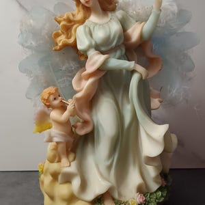 Angel of Hope Figurine and Music Box - Etsy