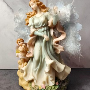Angel of Hope Figurine and Music Box - Etsy