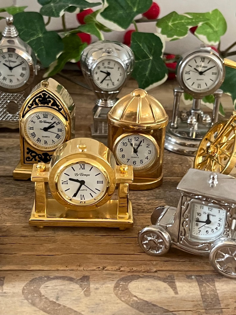 Le Temps French Miniature Quartz Clocks Collection. A Set of Eleven ...