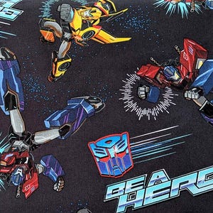 Transformers - Autobots Be a Hero Cotton Fabric on Navy by Springs ...
