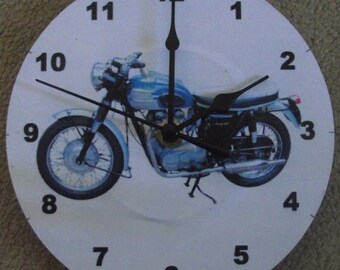 Triumph Clock - Etsy