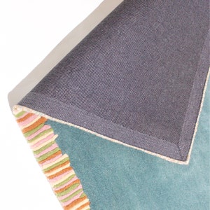 Stitched and Striped Hand Tufted Wool Rug, Colorful Blue Peach Green ...