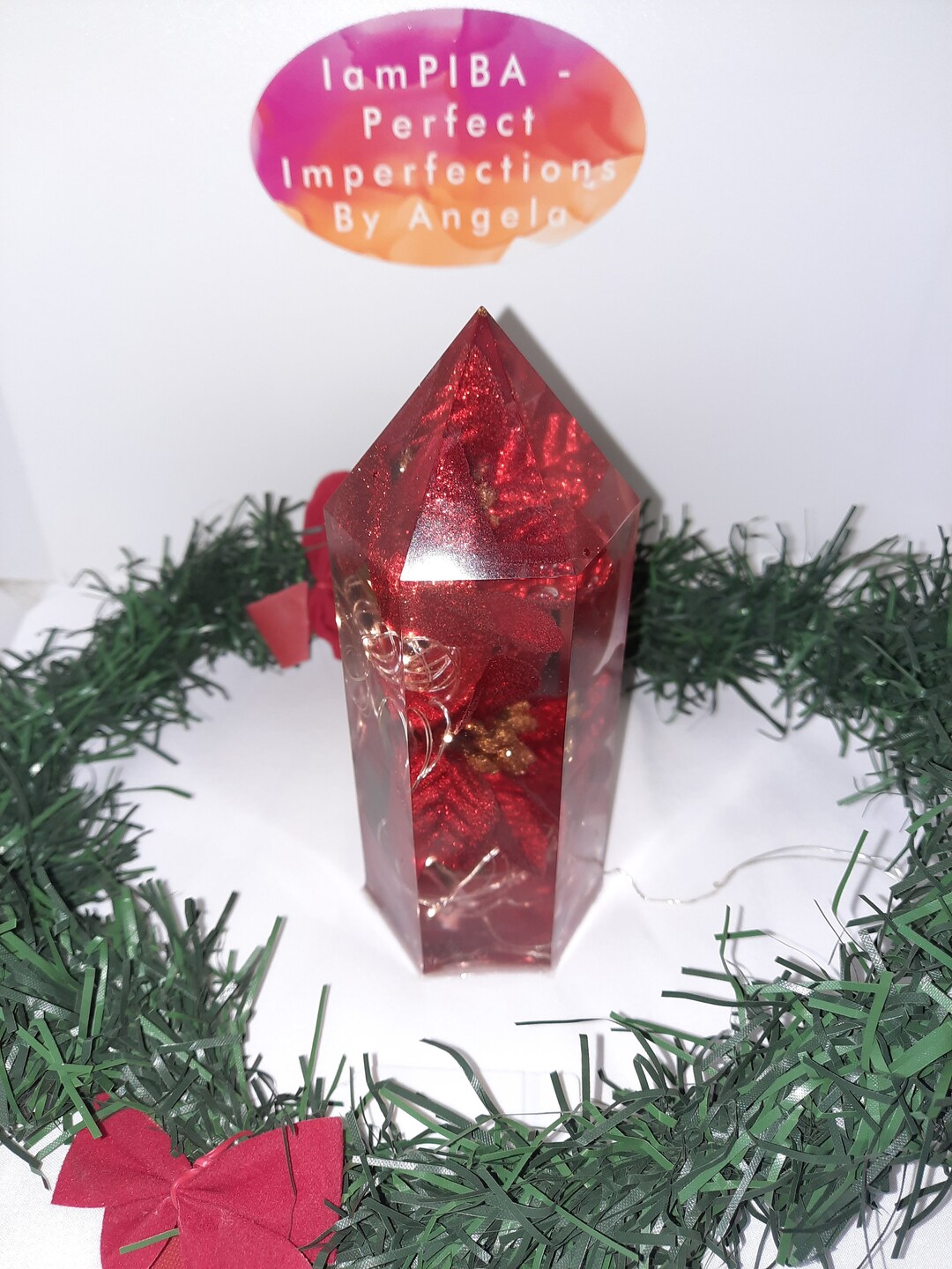 Faux Poinsettia Resin Tower With Fairy Lights. Poinsettia. Resin Tower ...
