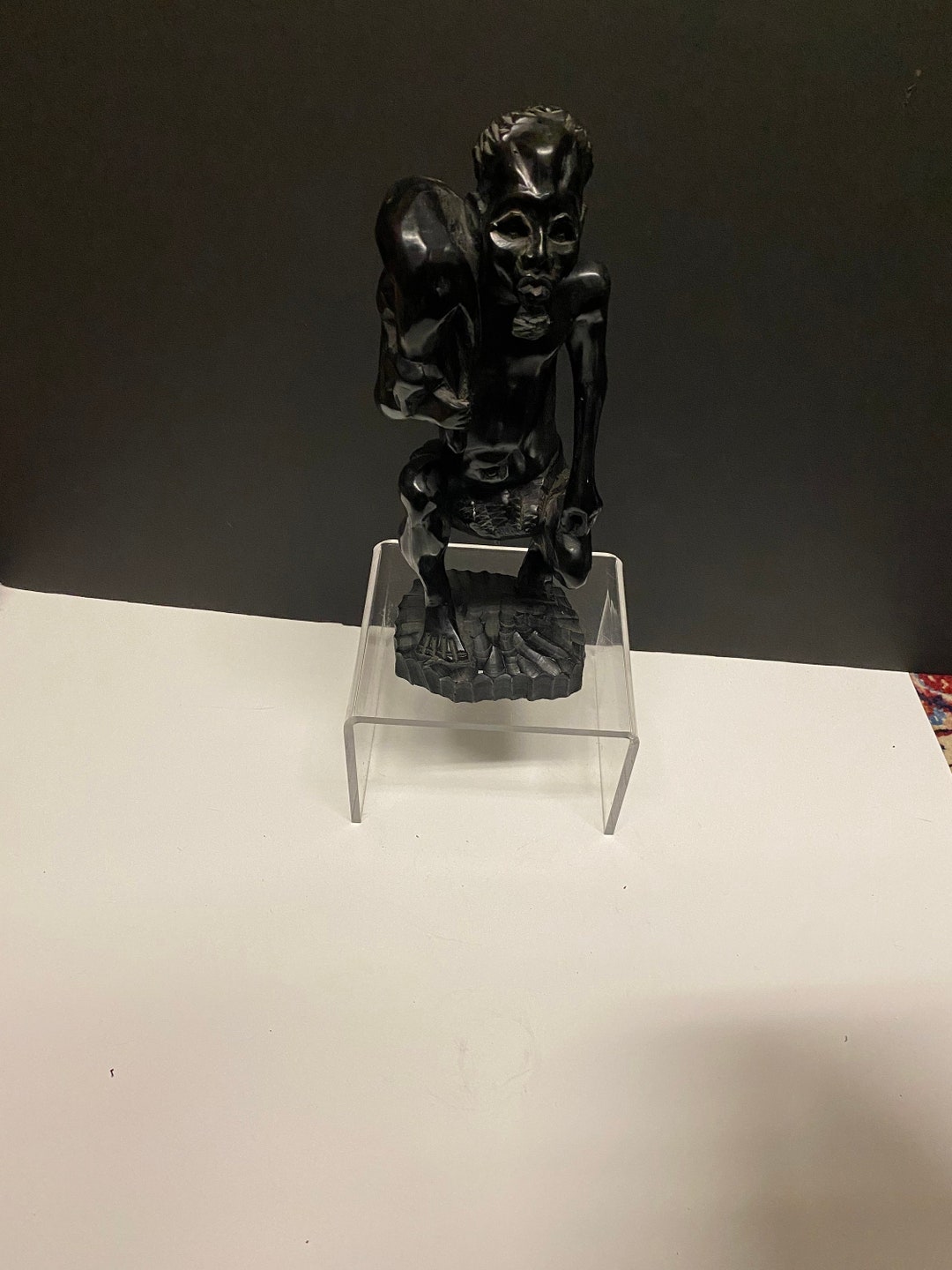 A Foot Tall Vintage African Ebony Wood Statue of a Man Carrying an ...