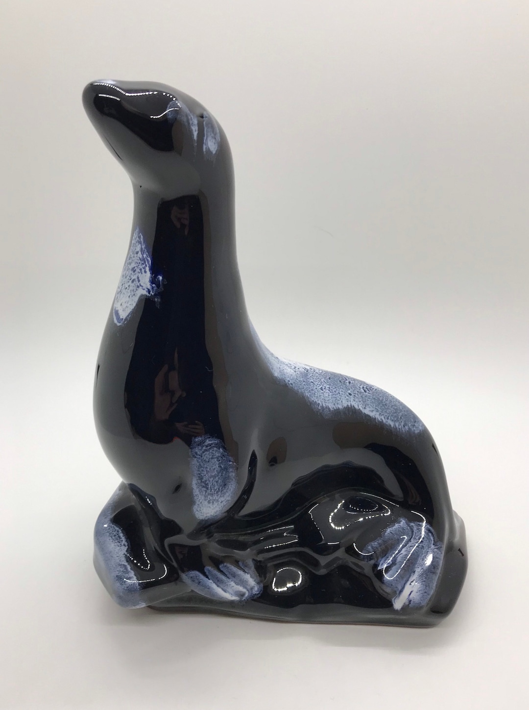 Vintage Blue Mountain Pottery Seal on a Rock With Dark Blue Granite ...