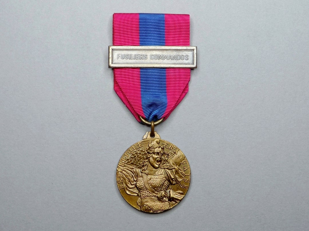 National Defense, With Clasps Commando Rifles. Medals With Ribbon ...