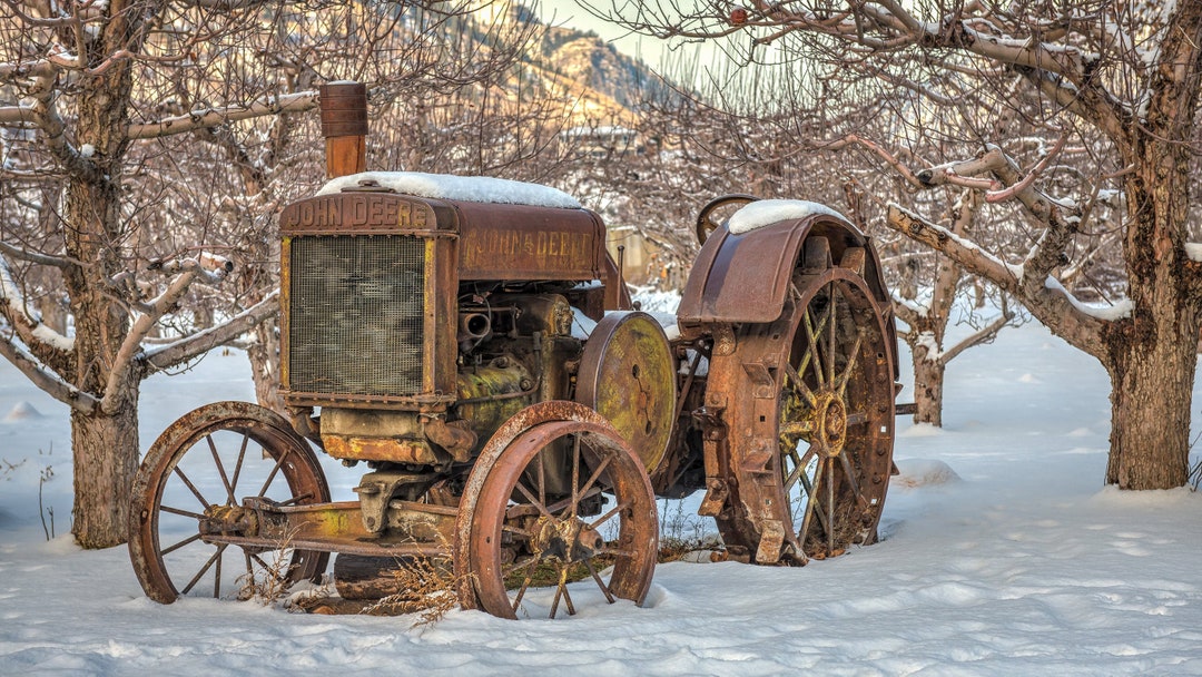 Retro Rusty Abandoned Antique Vintage John Deere Farm Tractor in Snowy ...