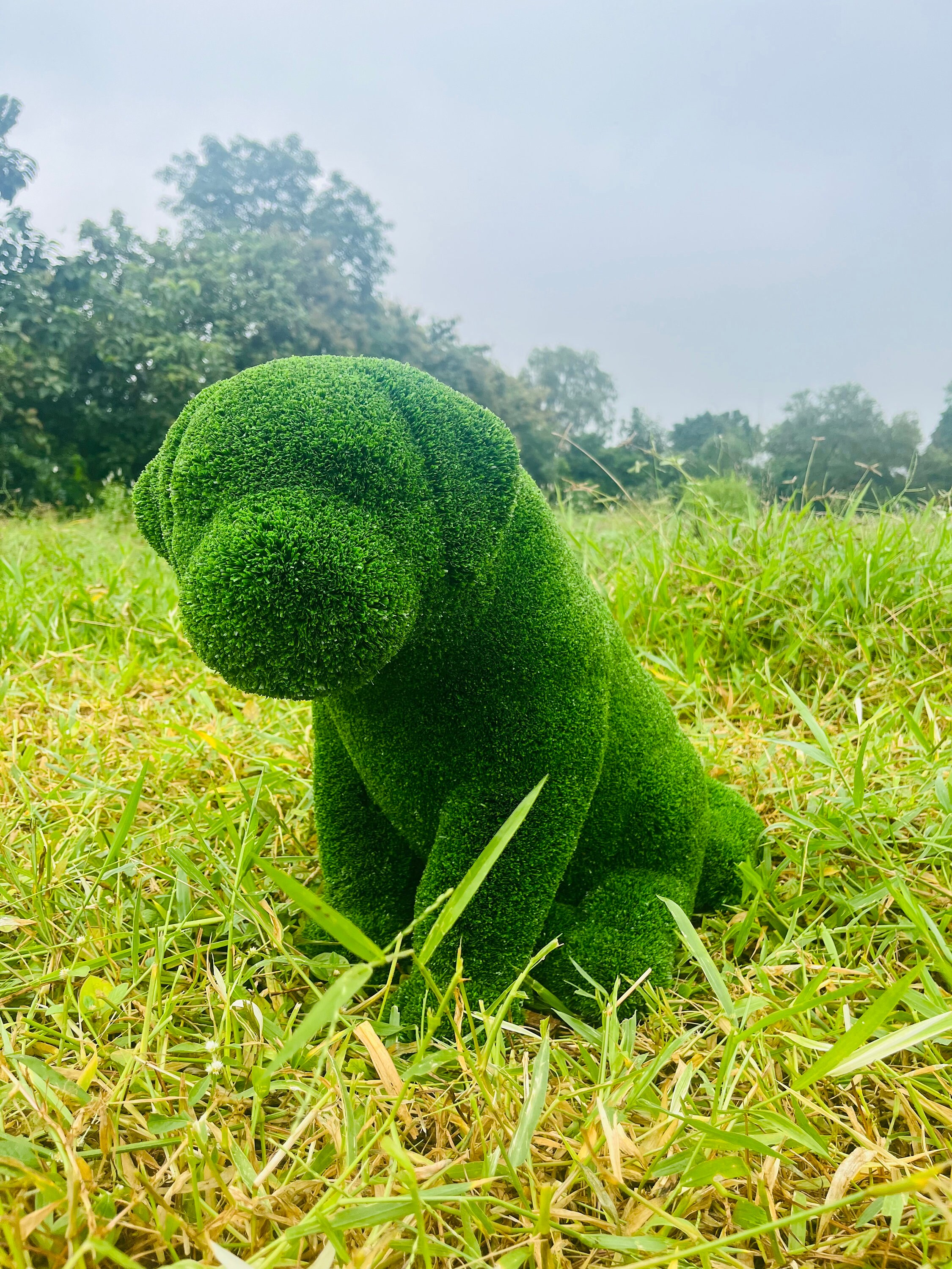 Animal Topiary Green Dog Puppy Sitting is Made of Fibreglass and ...