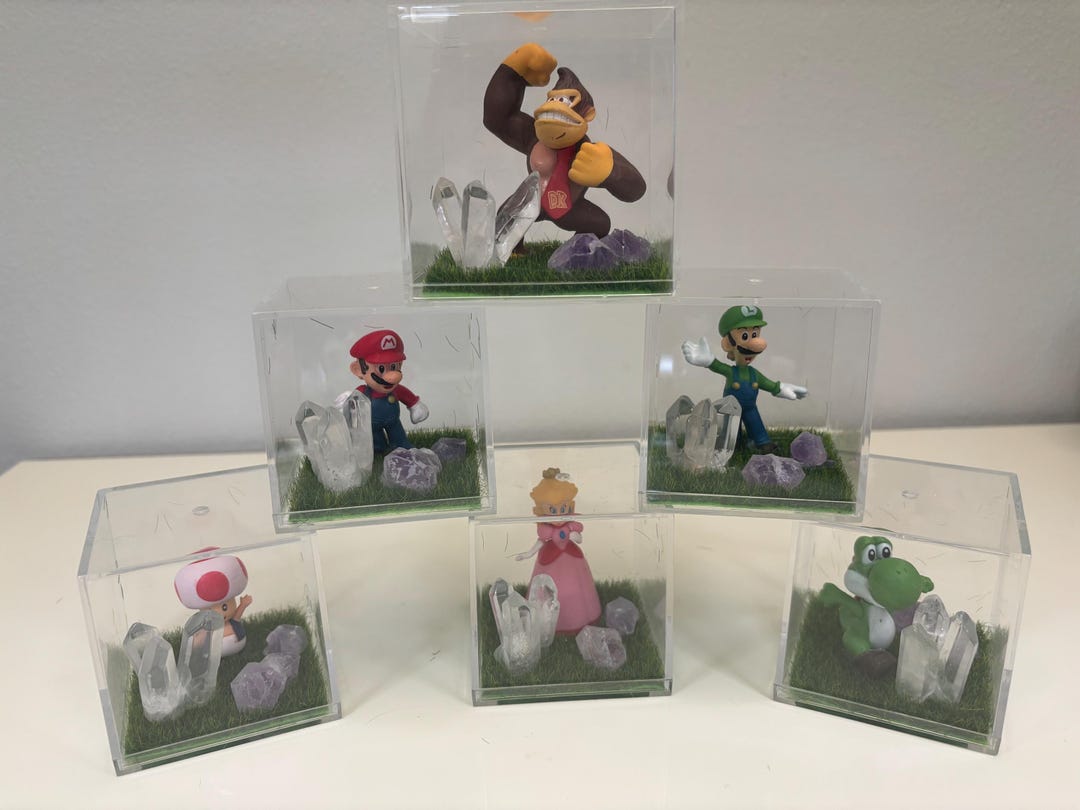 Super Mario Brothers Collectable Figures With Crystals. Set in an ...